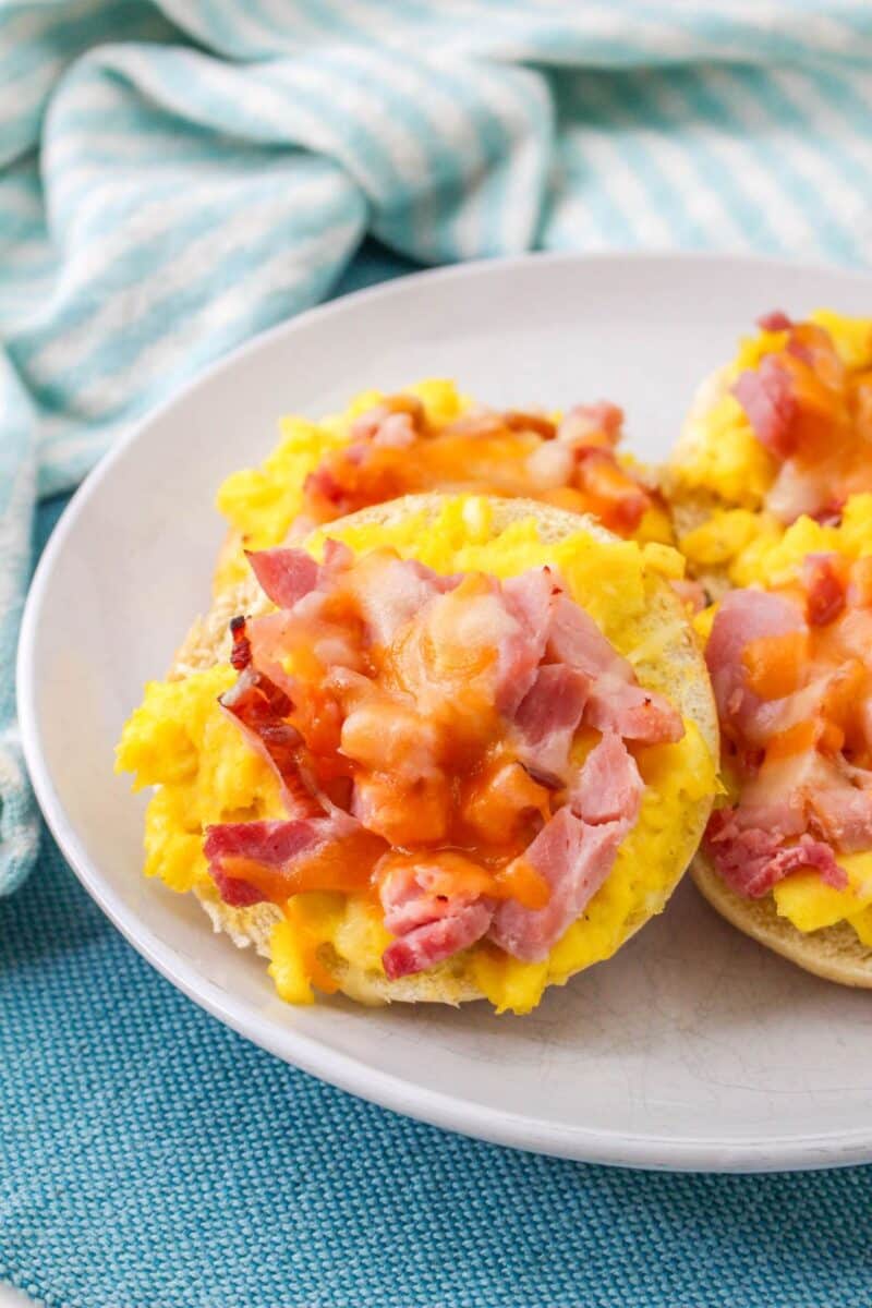 Cheesy Ham & Egg Breakfast Bagels - Cook This Again Mom